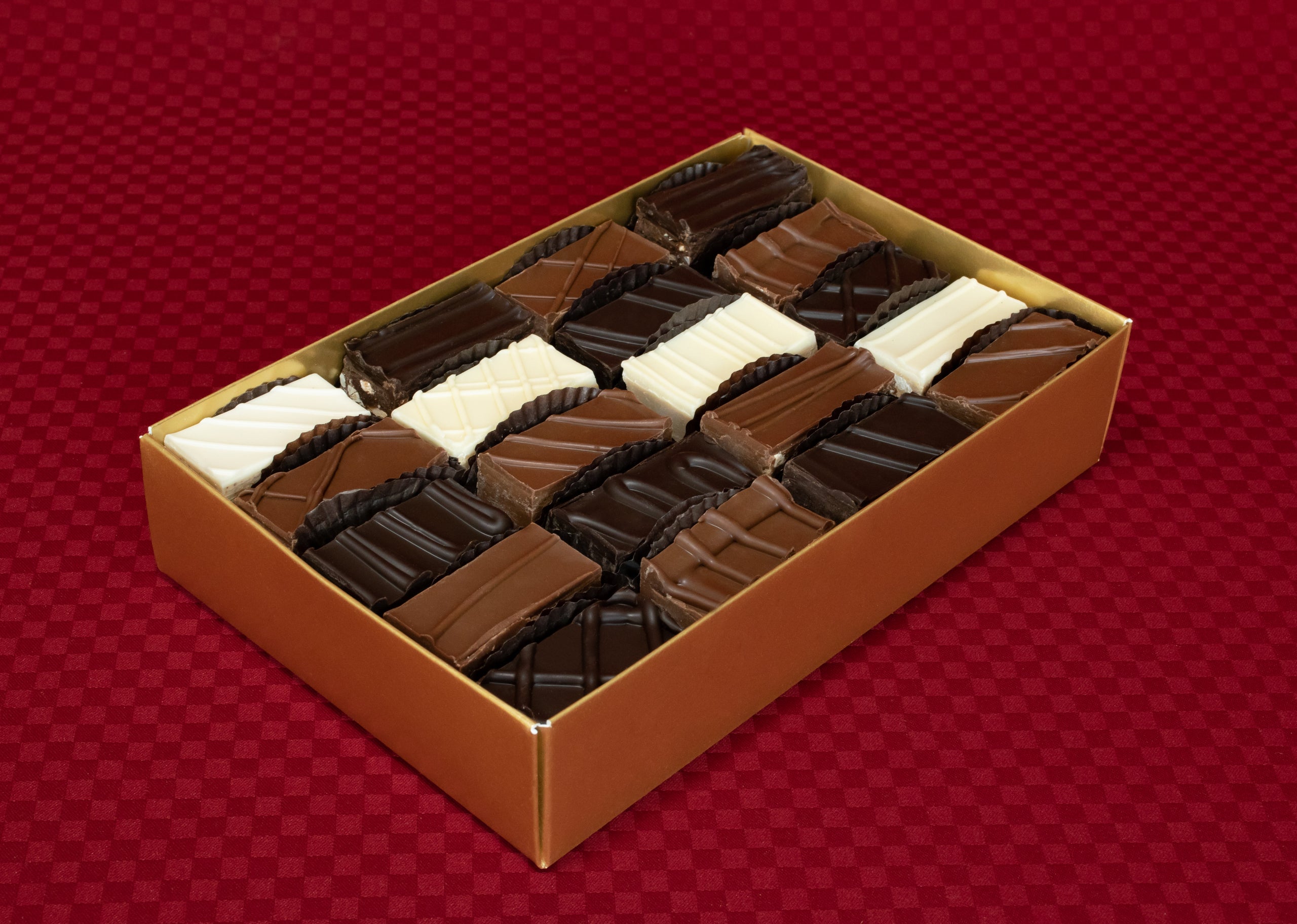 Praline assortment with smooth almond, peanut butter, hazelnut and ...